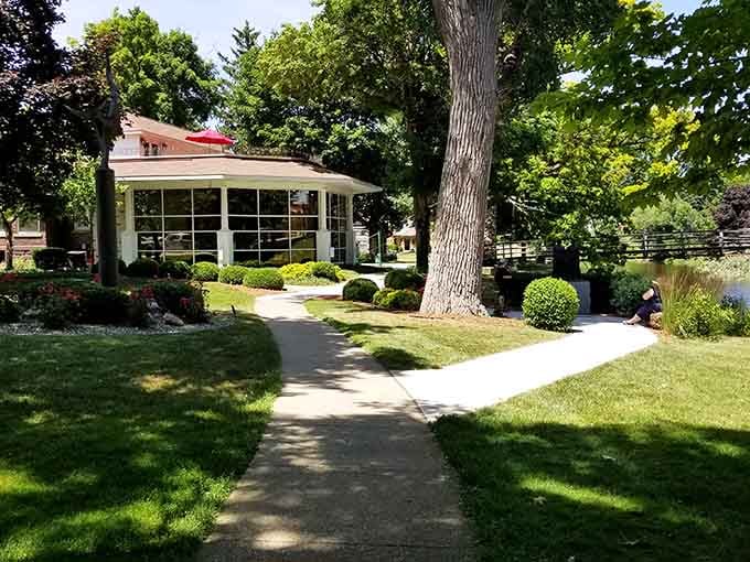 Peaceful pathways wind through Curwood Castle Park, inviting leisurely strolls and contemplative moments by the water.