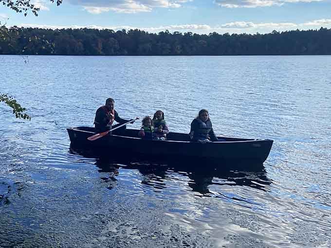 Family paddling adventures on calm waters, creating memories that don't require WiFi or screen time.