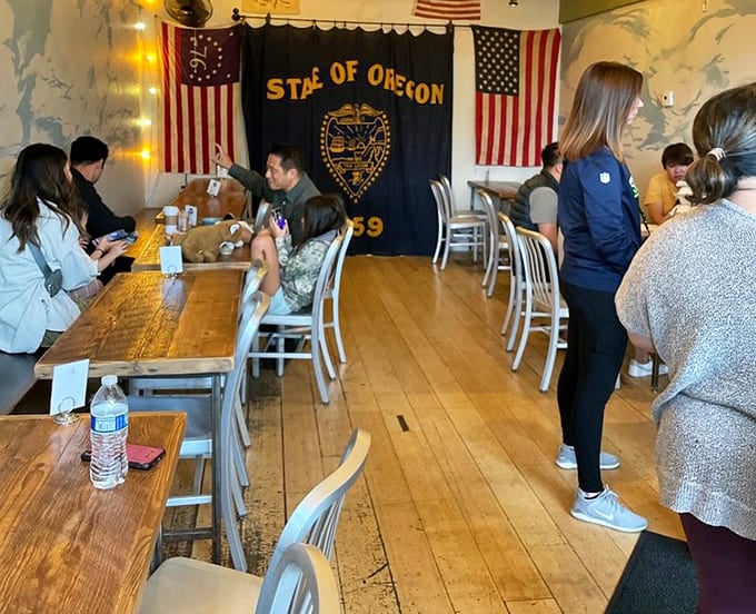 Happy diners beneath an Oregon flag know they've discovered something special, and they're not keeping it a secret for long.