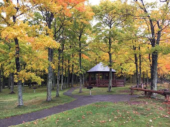 The historic gazebo nestled among fall colors, offering shelter and Instagram opportunities in equal measure for grateful visitors.