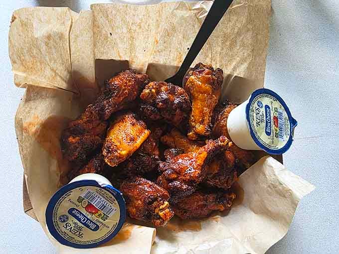 Wings glazed to perfection, ready to make your taste buds sing and your napkin supply vanish.