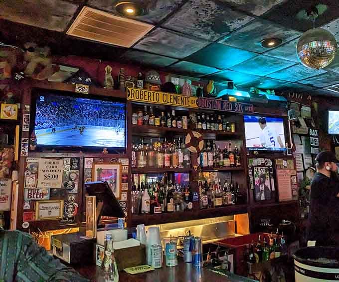 Behind the bar, bottles line up like soldiers ready for duty under a disco ball's watchful sparkle.