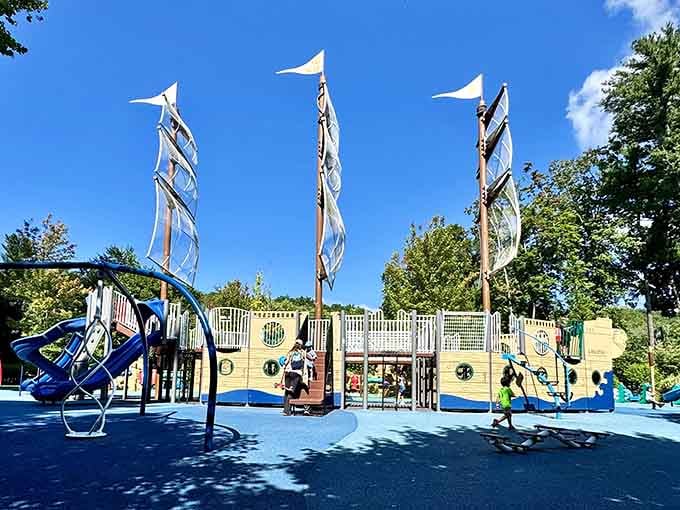 Three tall masts with billowing flags announce this playground's nautical theme from across the entire park.