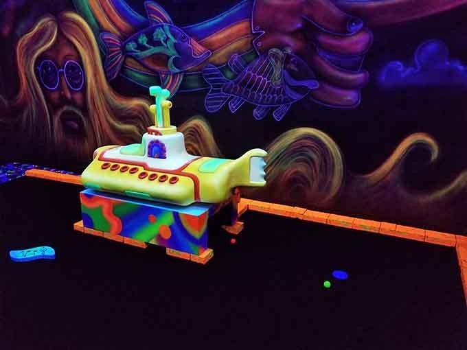 The Yellow Submarine surfaces in fluorescent glory, proving the Beatles' legacy extends even to Minnesota mini golf courses.