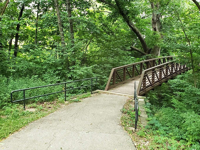 Rodeo Park's walking trails offer a peaceful escape into nature, where wooden bridges connect visitors to the quieter side of Iowa.