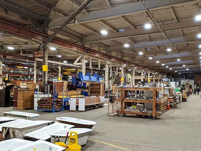 The warehouse stretches on like a treasure hunter's fever dream, with discoveries waiting around every industrial corner ahead.