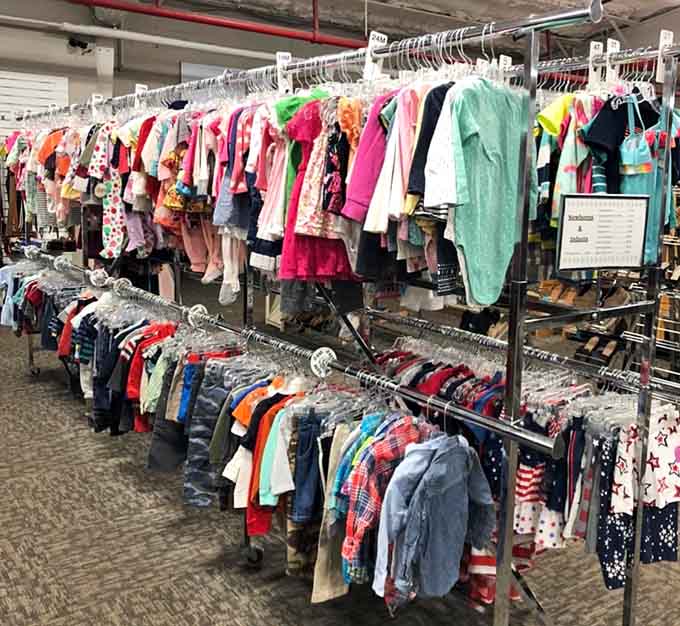 Kids' clothing organized by size because someone here actually understands how parents shop when they're exhausted.