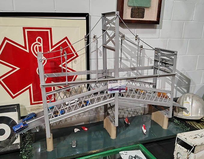 The Silver Bridge model serves as a somber reminder of the tragedy that forever linked the Mothman legend with disaster prophecy.