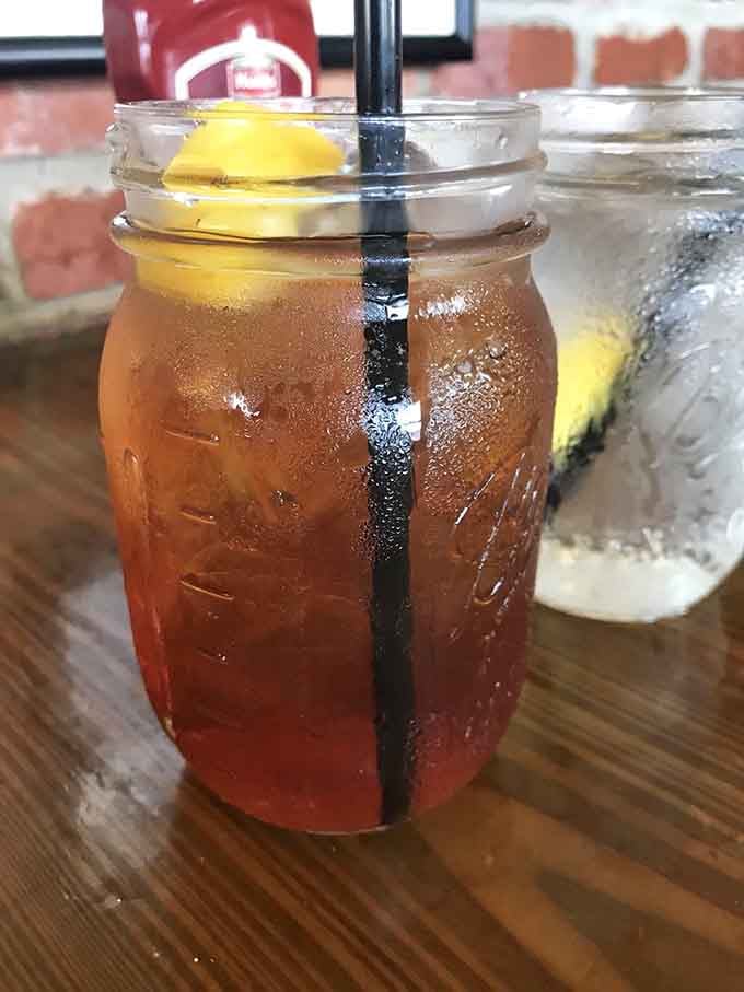 Iced tea catching the light like liquid amber, ready to wash down whatever fried deliciousness you're about to devour.