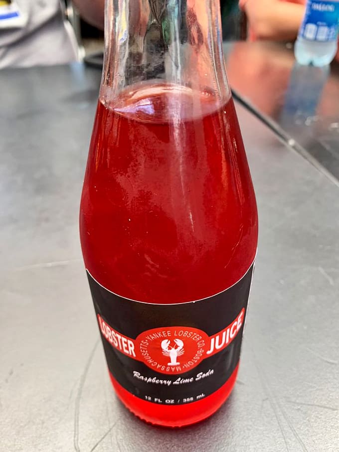 Their signature raspberry lime soda brings a pop of color and tang that cuts through rich seafood like a well-timed joke.