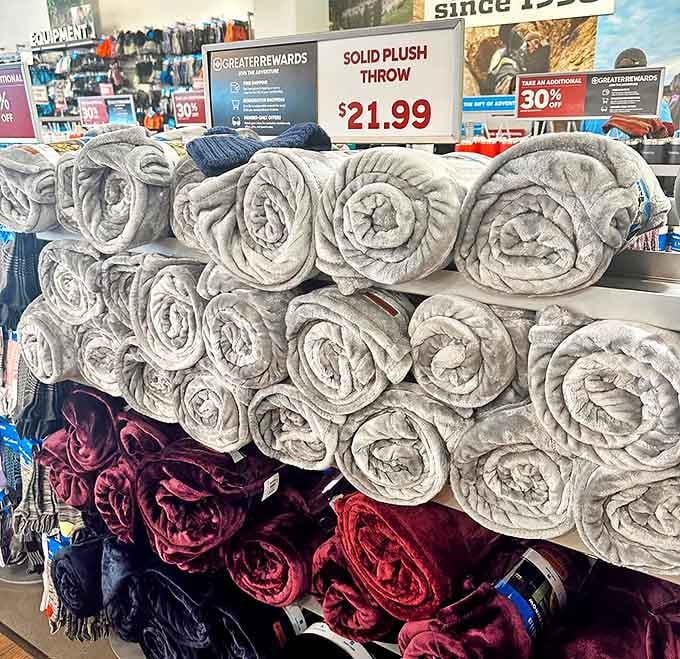 Cozy throws stacked like fluffy clouds. The perfect impulse purchase that somehow justifies itself on even the warmest Utah day.