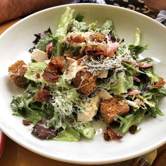 A Caesar salad so fresh and loaded it makes eating greens for breakfast feel like the smartest decision ever.