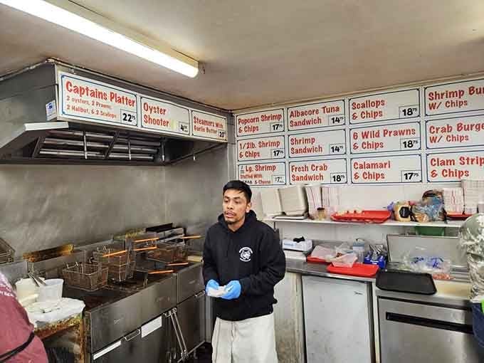 Behind the counter, skilled hands work the fryers with practiced precision, transforming fresh catch into crispy coastal magic daily.