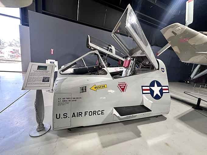 The F-106 Delta Dart cockpit open wide, inviting you to imagine pulling some serious G-forces up there.