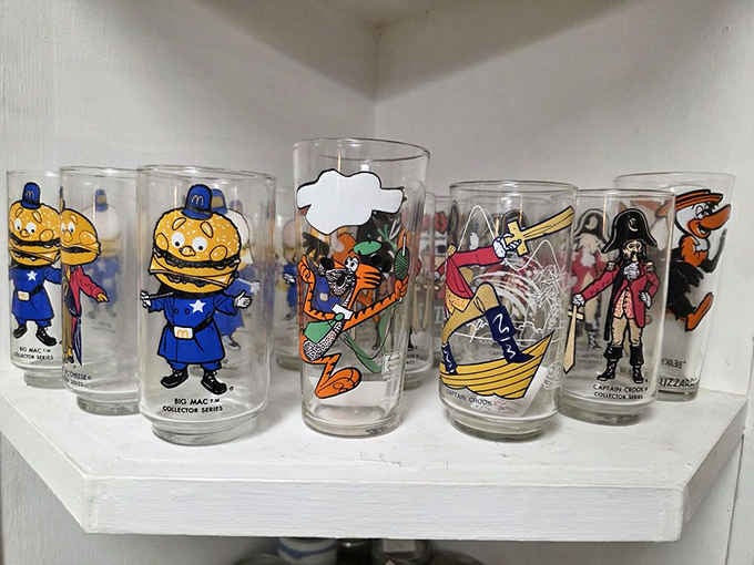 Collectible glasses that once held everything from milk to martinis, now holding court in their display case retirement home.