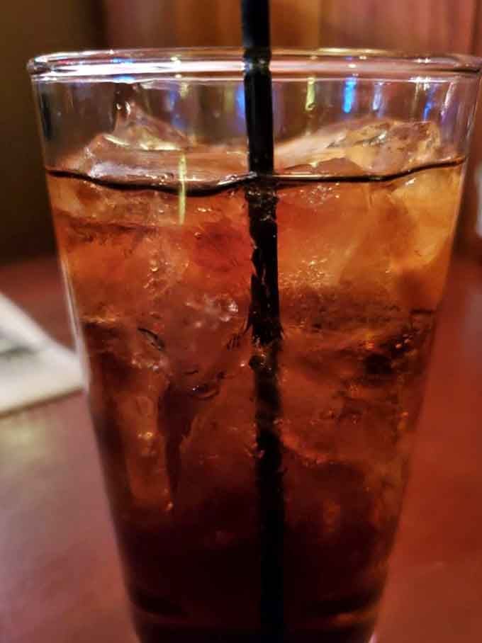 A perfectly poured cocktail over ice, ready to complement your steak and make the evening feel like the special occasion it is.