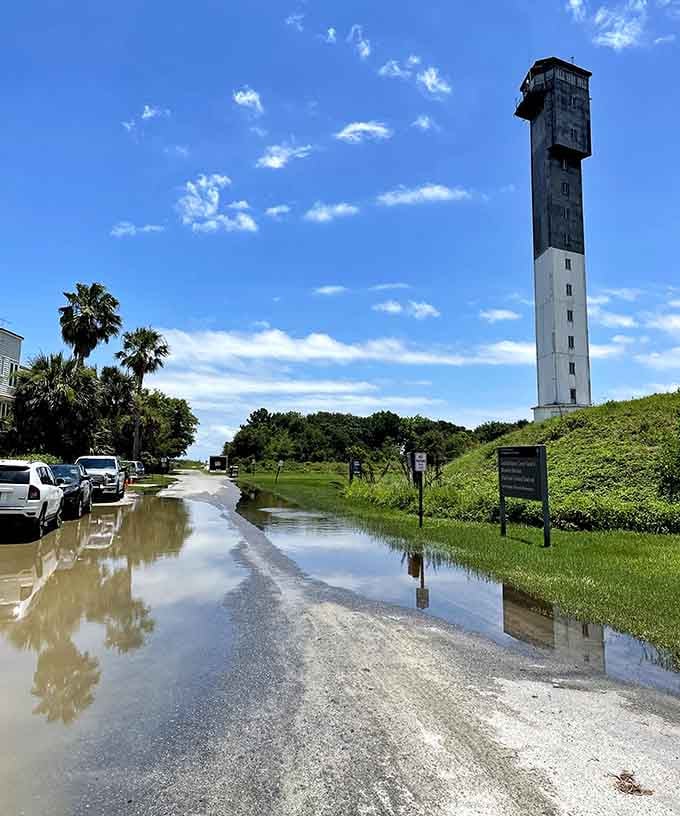 Palm trees frame the geometric tower against cotton-candy clouds, a perfect marriage of tropical charm and mid-century modern architectural boldness and vision.