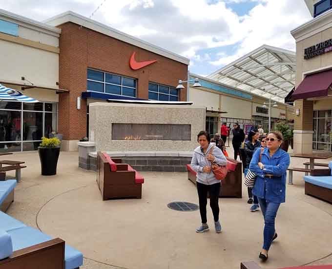 The outdoor courtyard with a fireplace offers the perfect spot to rest your weary feet between shopping marathons and credit card swipes.