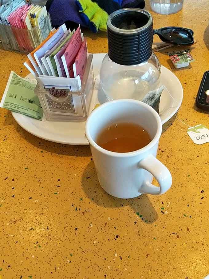 Hot tea served properly with an assortment of options. Sometimes civilization is measured in these small, steaming cups of refined comfort.