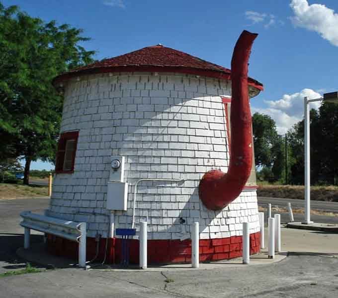 The view from behind reveals the teapot's impressive spout, proving the builders committed fully to their whimsical vision.
