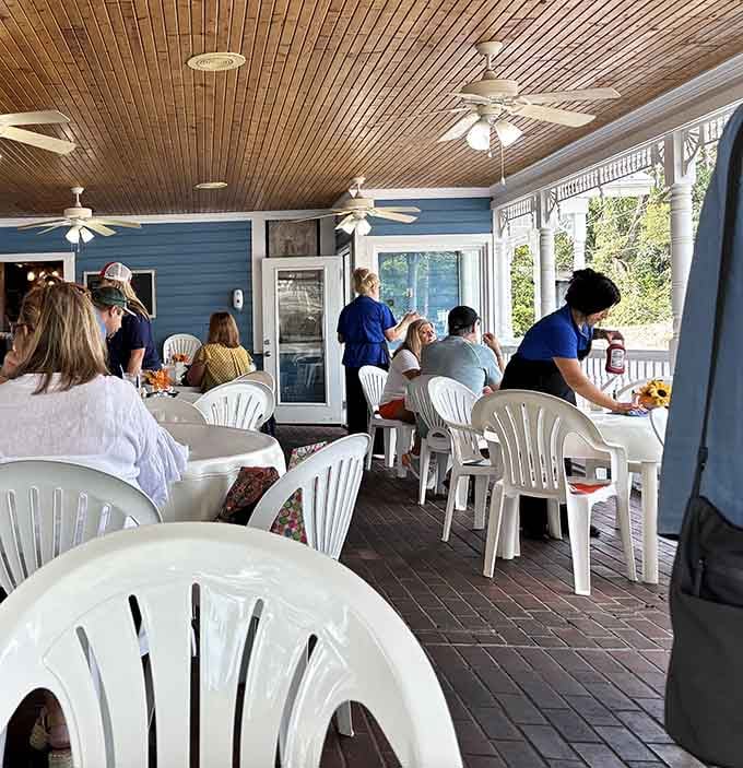 The covered porch fills up fast because everyone knows the best seats offer people-watching with your pie.