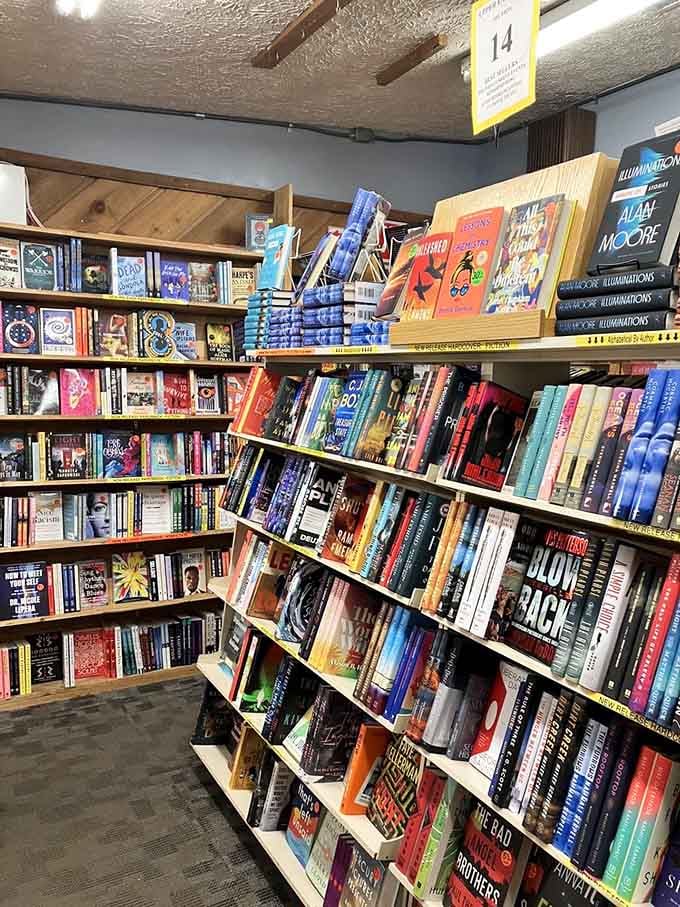 Current bestsellers stacked high in Room 14, proving popular doesn't have to mean paying full retail price.