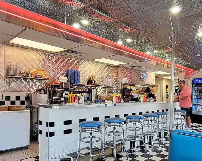 Counter seating with chrome stools where you can watch the magic happen right before your eyes.