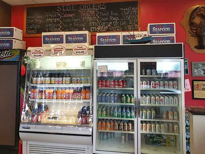 A well-stocked beverage cooler offers everything from classic sodas to refreshing drinks that pair perfectly with fried seafood.