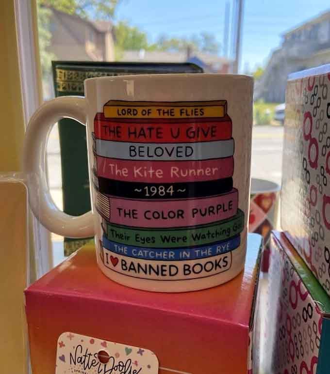 That banned books mug celebrates literary freedom with titles that changed the world despite attempts to silence them.