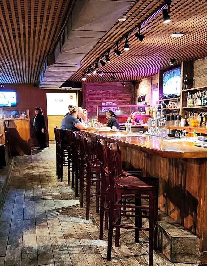 The bar area blends modern comfort with historic charm, perfect for a pre-dinner cocktail or three if you're feeling adventurous.