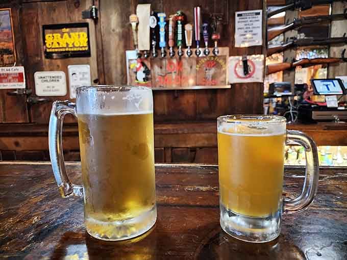 Cold beer in frosty mugs at the bar, where you can toast to surviving the menu without cracking up.