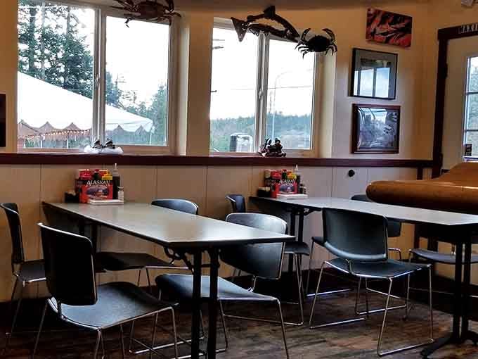 Simple tables with waterfront views and nautical decor create the perfect casual atmosphere for enjoying fresh catches.