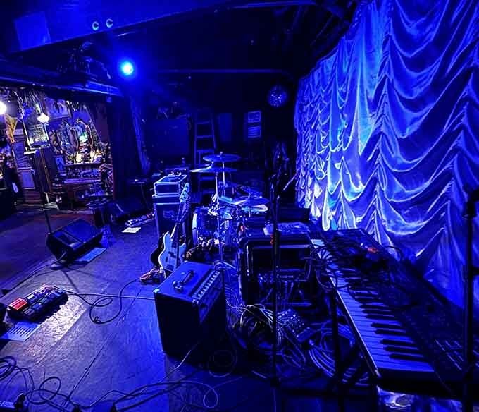 The stage at The Sparrow & Serpent hosts live music that adds soundtrack magic to your meal.