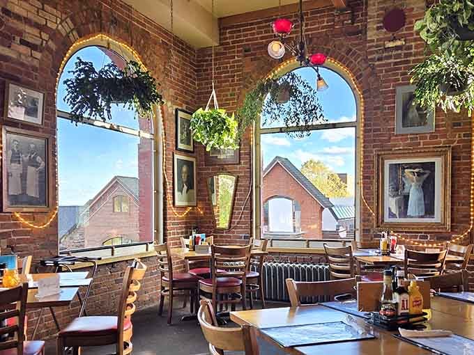 Arched windows with hanging plants offer views so pretty you might forget to eat, but that would be a terrible mistake.
