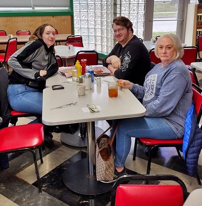 Three generations sharing a meal at a three-generation restaurant—that's poetry you can actually taste.