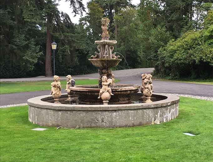 A fountain featuring cherubs who've been splashing around these grounds longer than most of our family trees.