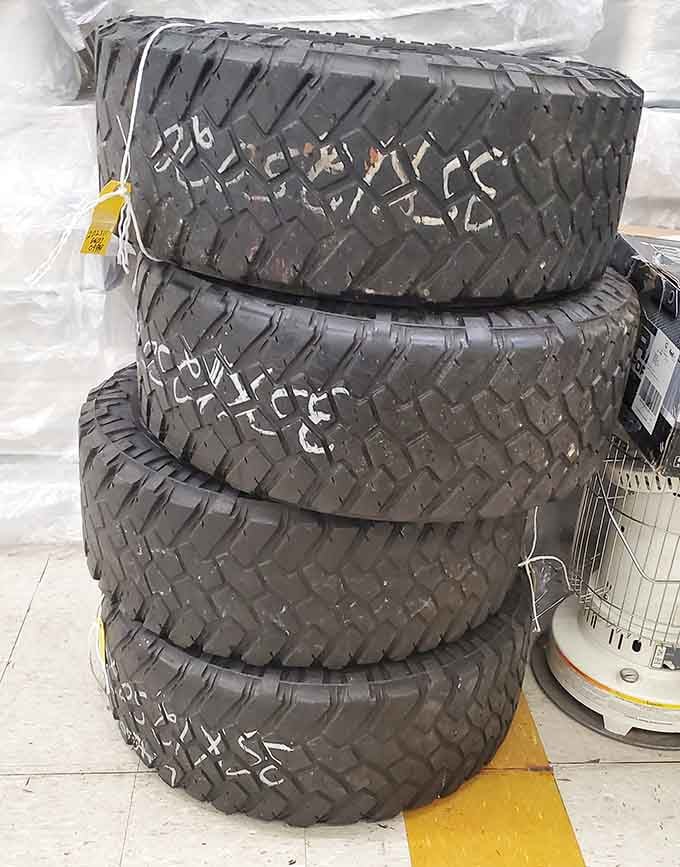 Truck tires stacked like modern sculpture&mdash;perfect for your vehicle or that post-apocalyptic garden feature you've been planning.