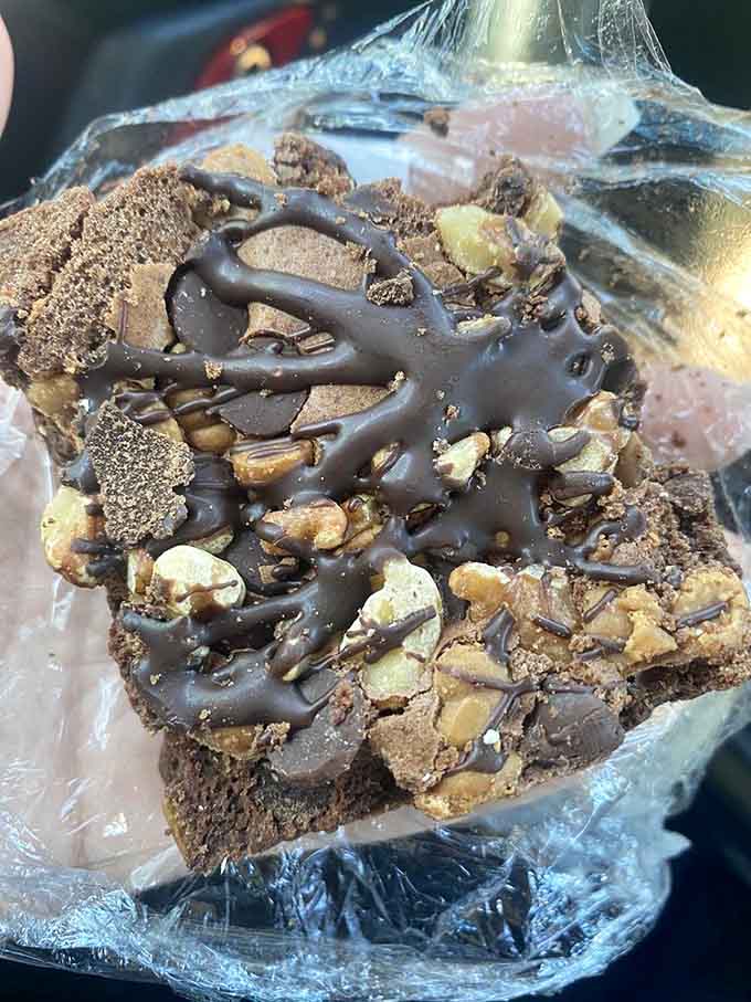 That rocky road brownie with chocolate drizzle is the perfect sweet ending to your savory sandwich adventure, no willpower required.