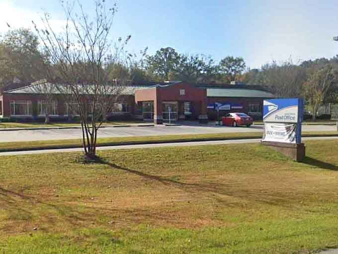 Even the post office maintains that classic institutional look, serving the community with reliable efficiency in a no-nonsense brick building.