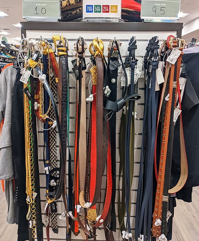 Belts organized by color like a rainbow made specifically for holding up pants, which is their actual job after all.