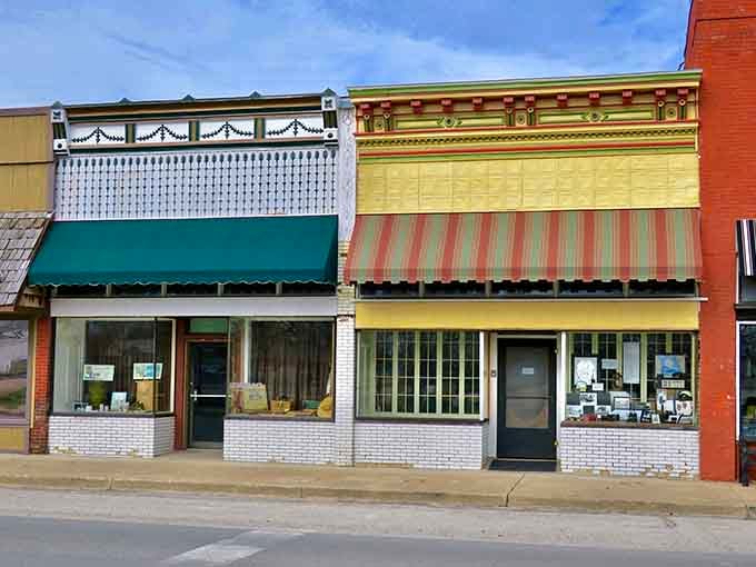 Colorful storefronts displaying the kind of architectural charm that developers try desperately to recreate in expensive new developments.