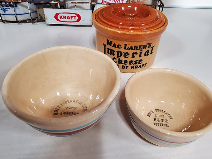 Vintage cheese crocks and bowls that remember when "artisanal" wasn't a marketing term, just how things were actually made back then.