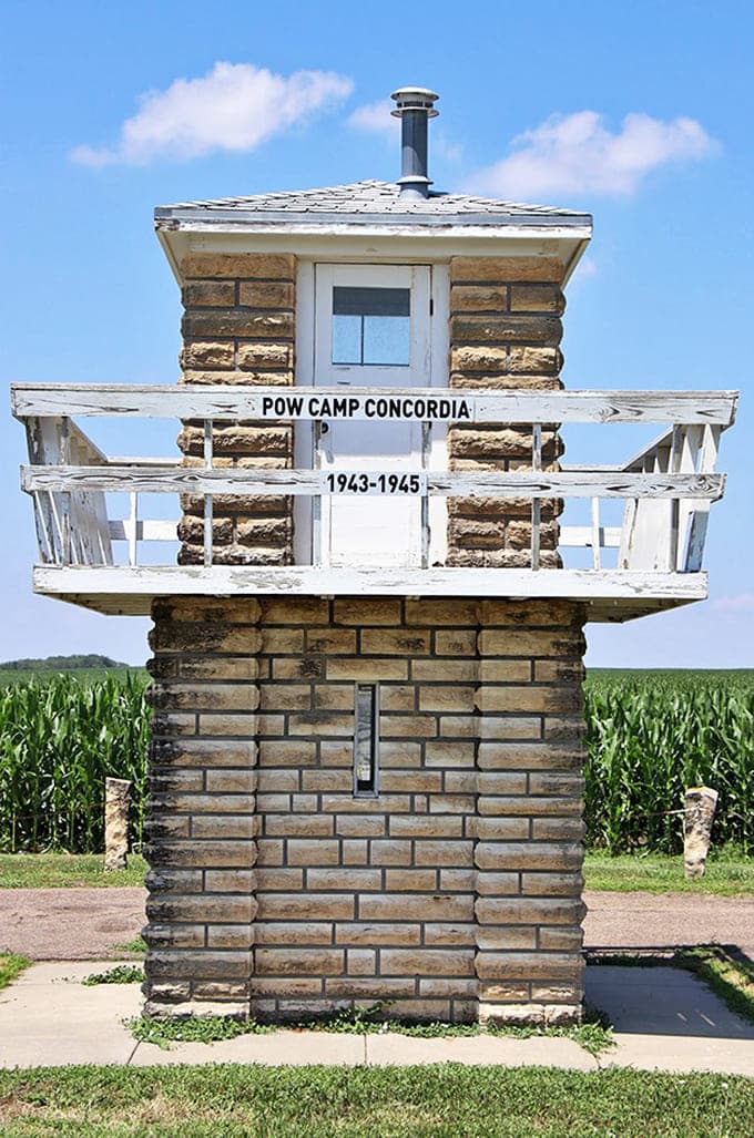 This guard tower memorial honors a unique piece of World War II history that happened right here in Kansas.