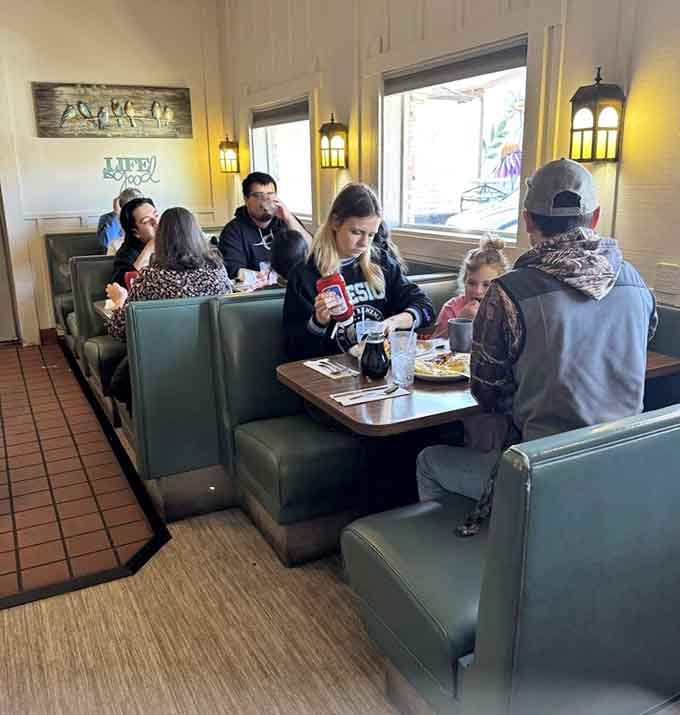 Families gathering in booths, creating new memories in a place that's been hosting them for over seven decades.