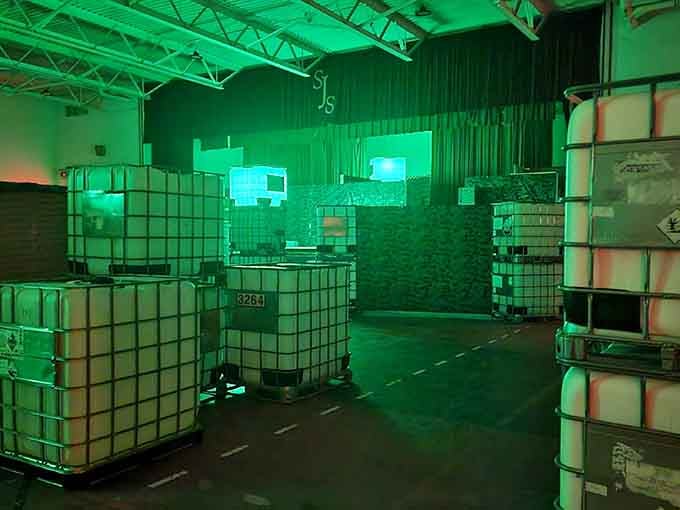 Eerie green glow transforms ordinary containers into sci-fi props, making escape room adventures delightfully disorienting and thrilling.