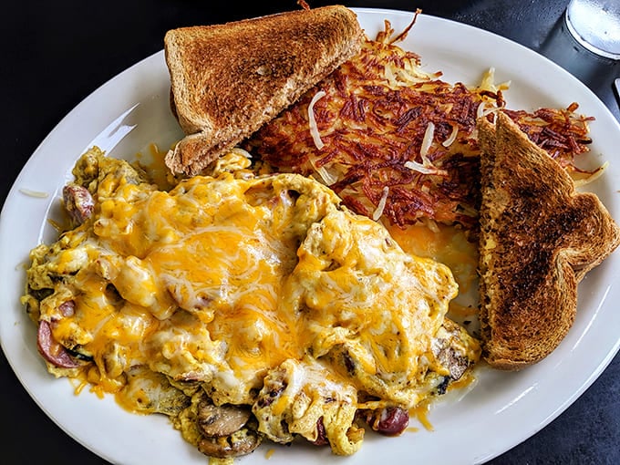 This isn't just breakfast&mdash;it's a skillet-sized monument to morning excellence with melted cheese as its crowning glory.