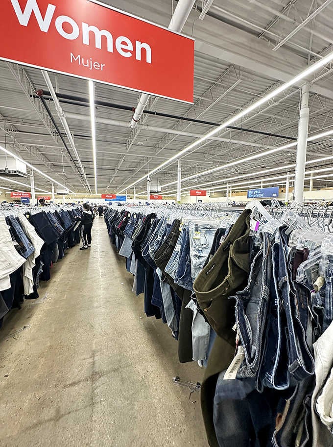 The women's clothing section stretches toward the horizon like a denim sea. Fashion democracy at its finest.
