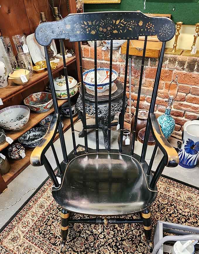 This stately Windsor-style chair with hand-painted details has witnessed more family dinners than your favorite restaurant booth. American craftsmanship at its finest.
