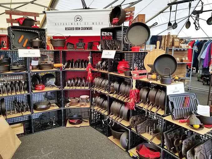 A meticulously organized display of rescued cast iron cookware proves that quality kitchen tools never go out of style&mdash;they just develop character.