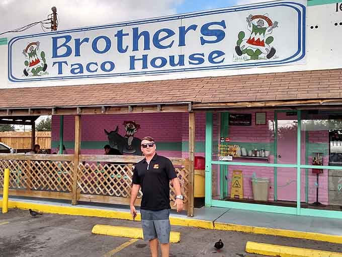 The exterior view with its colorful signage and cartoon mascots feels like stepping into a taco time capsule that thankfully never got the "modern upgrade" memo.